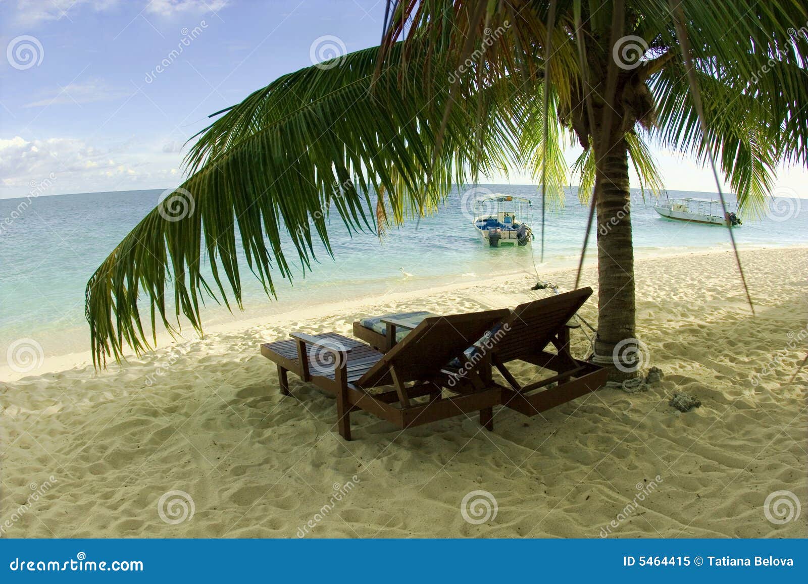 Relaxing on remote beach stock image. Image of outdoor - 5464415