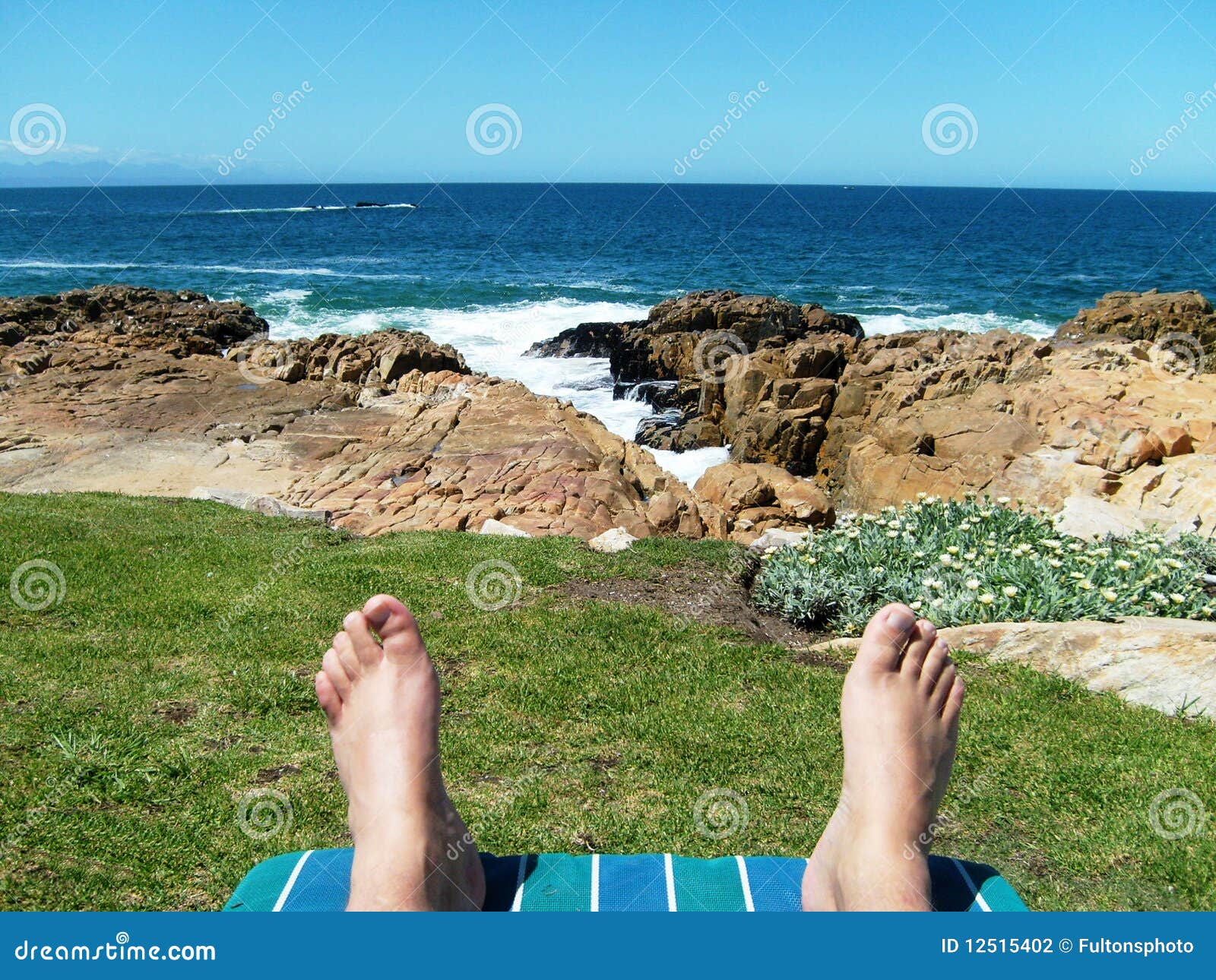 Relaxing by the seaside stock photo. Image of emotion - 12515402