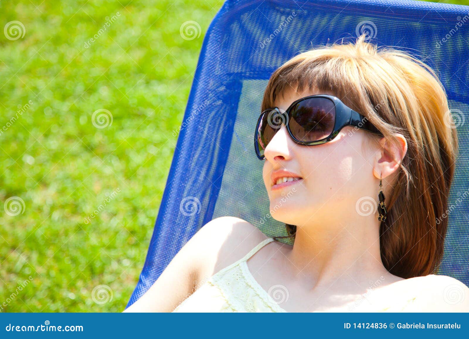 Relaxing in the sun stock photo. Image of leisure, green - 14124836