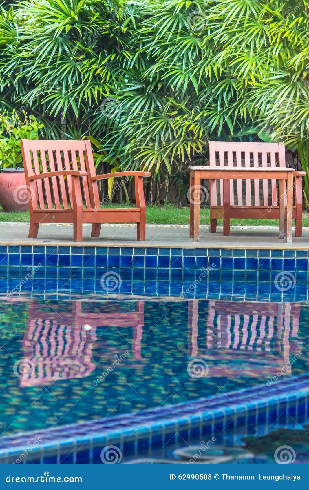 Relaxing Table Set beside Swimming Pool. Stock Photo - Image of pool ...