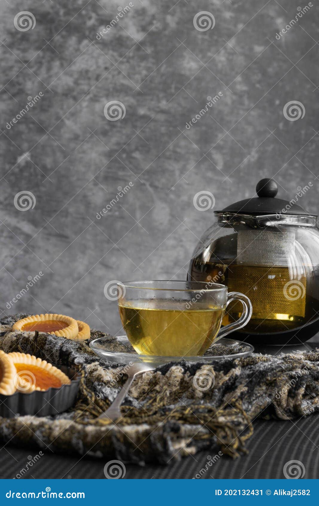 Relaxing Tea Time Concept. Dark Mood View of Herbal Tea and Cookies ...