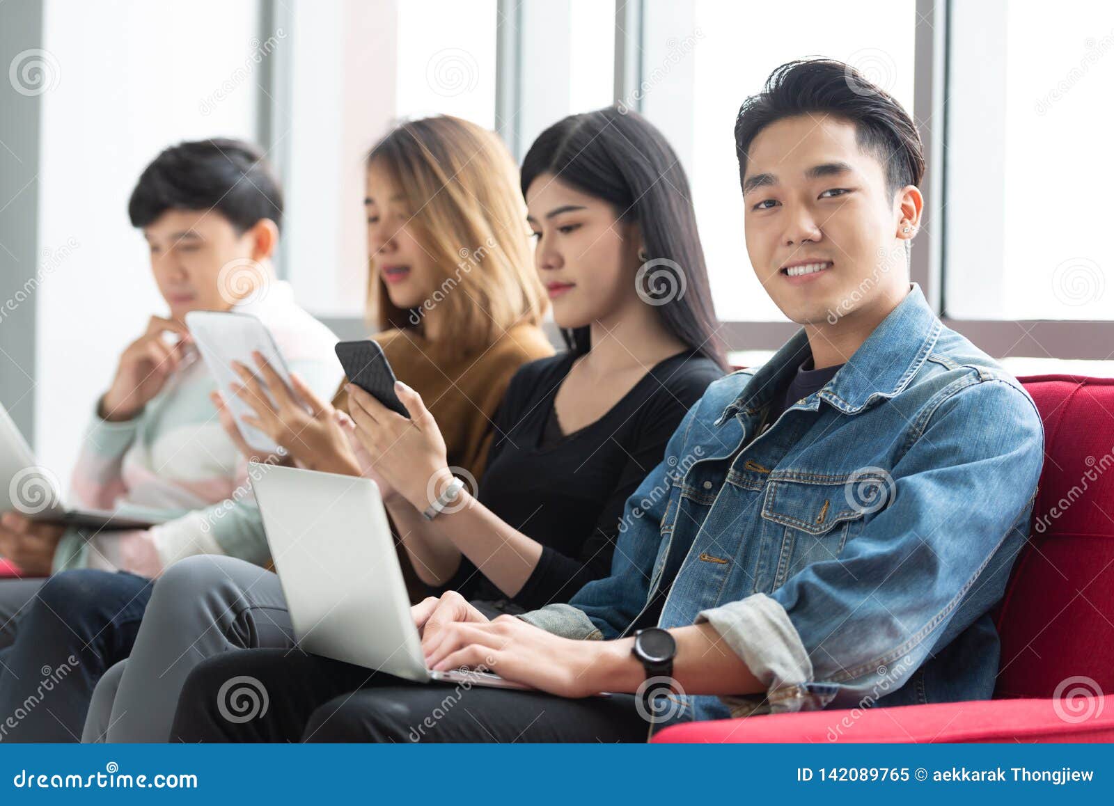 Relaxing with technology stock image. Image of lifestyle - 142089765