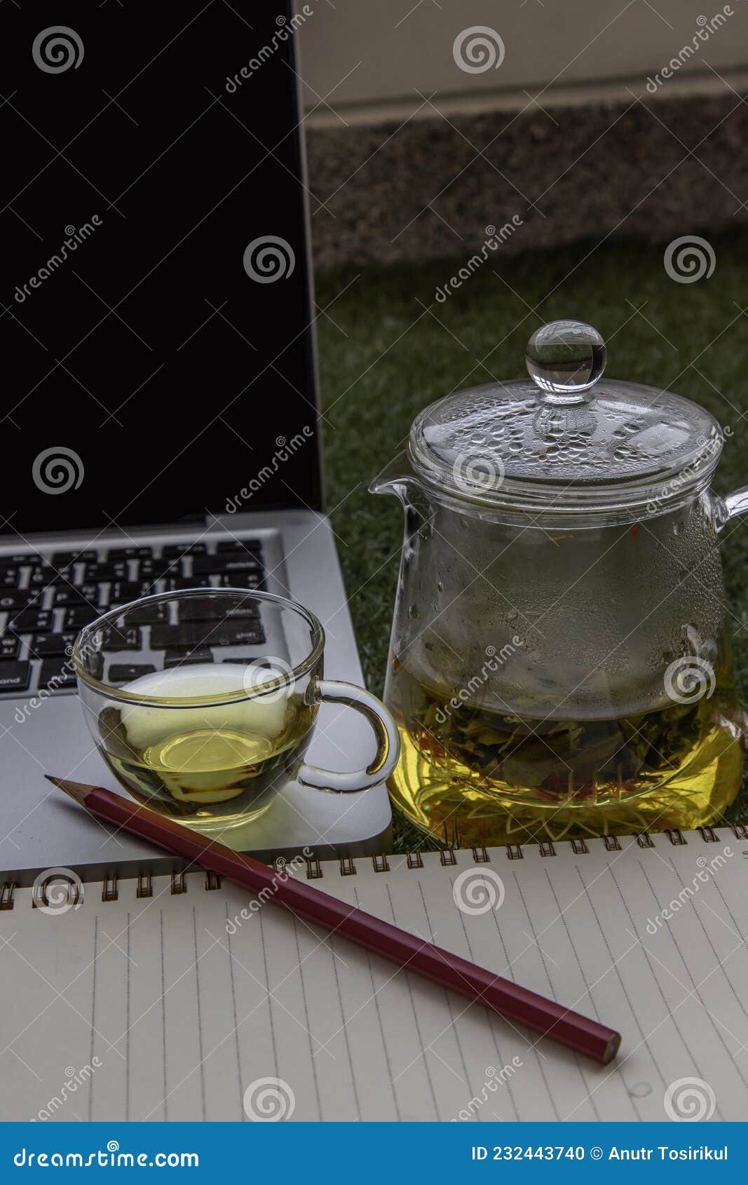 Relaxing Time with a Cup of Tea. Workplace Area with Laptop, Tea Cup ...