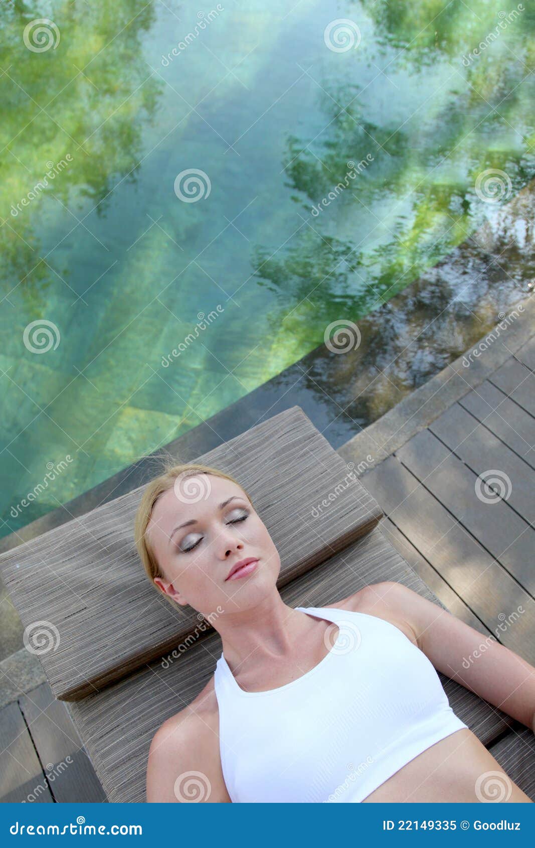 Relaxing time by the pool stock image. Image of nature - 22149335