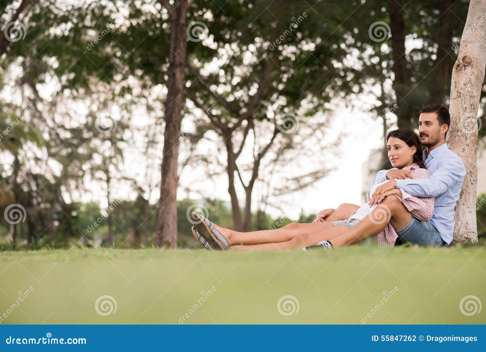 Relaxing under the tree stock photo. Image of relationship - 55847262