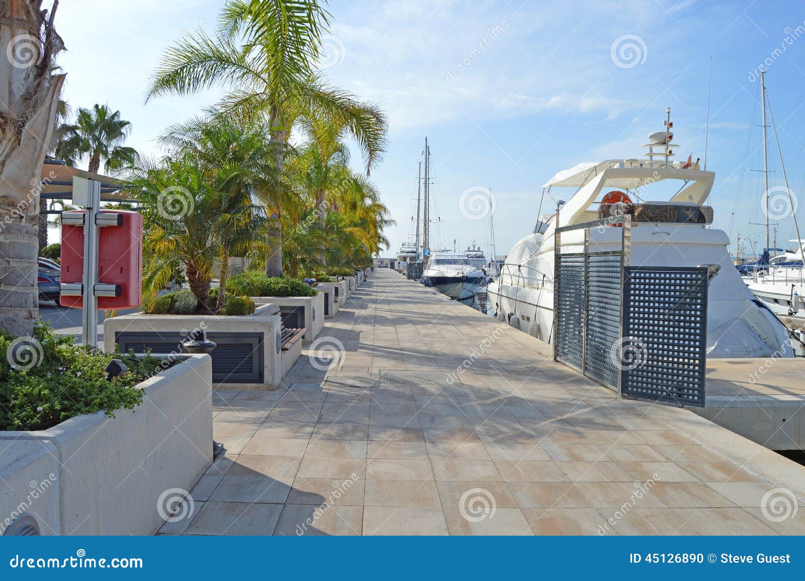 Boats in the Marina - Walkway Near Super Yachts Stock Photo - Image of ...