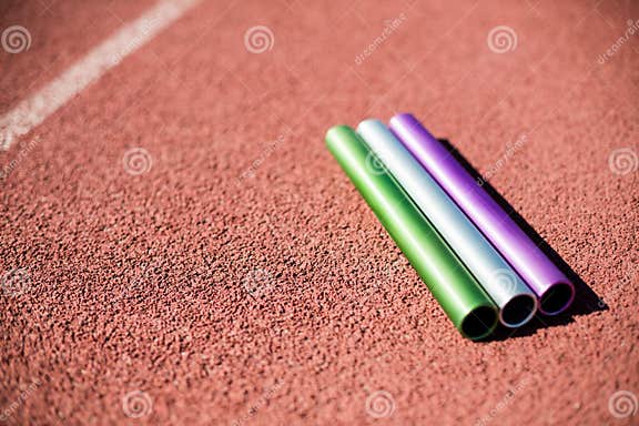 Relay Baton on Running Track Stock Image - Image of multi, racing: 74026113