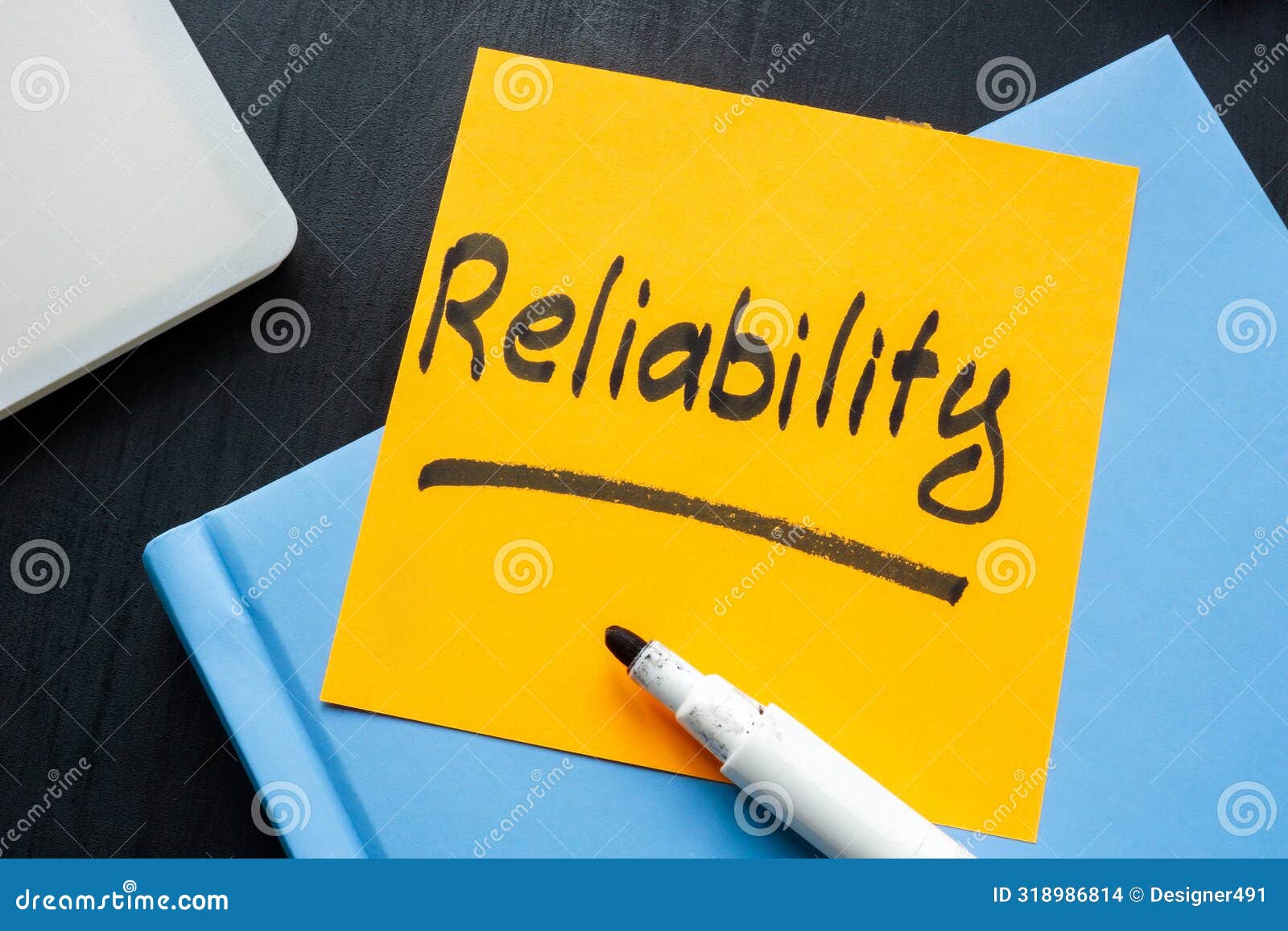 Reliability Concept. Handwritten Note on a Yellow Sticky Note. Stock ...