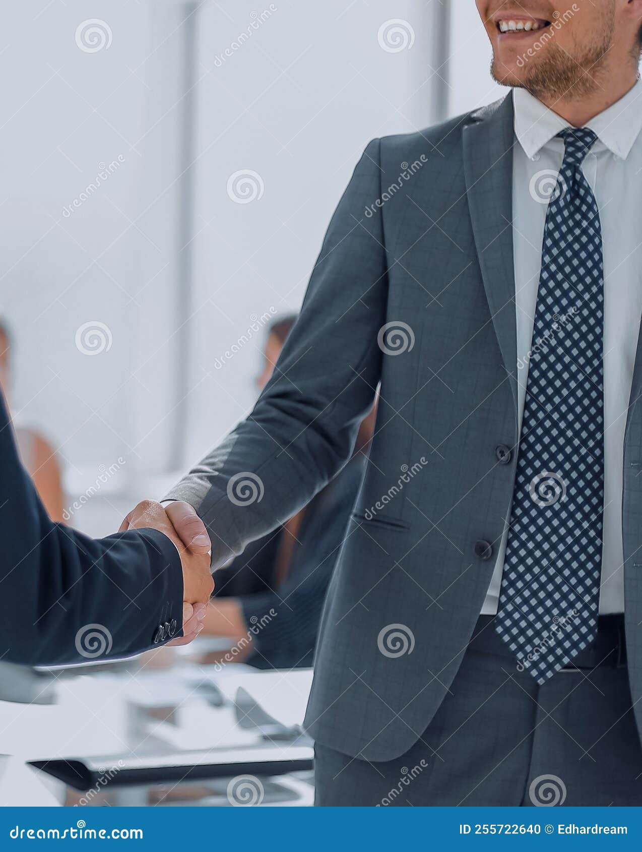 Reliable Handshake of Business Partners in the Office Stock Photo ...