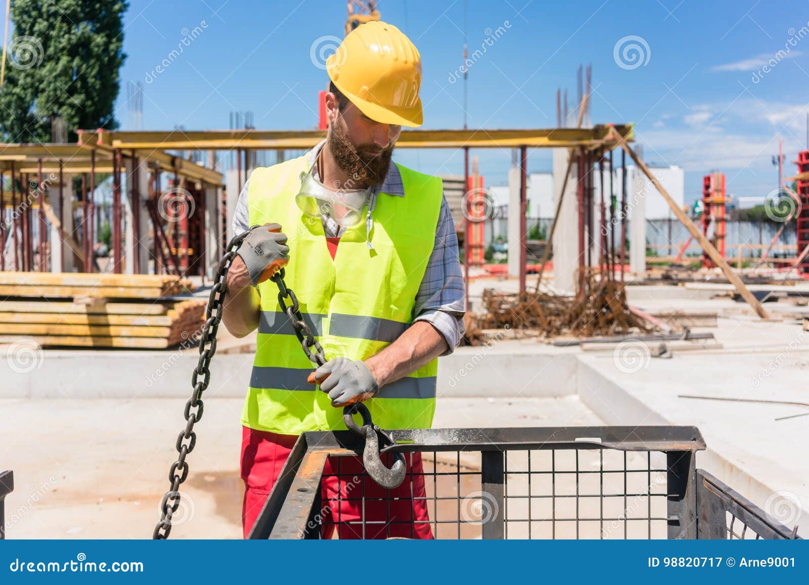 Reliable Worker Checking the Safety Latch of a Hook before Lifti Stock ...