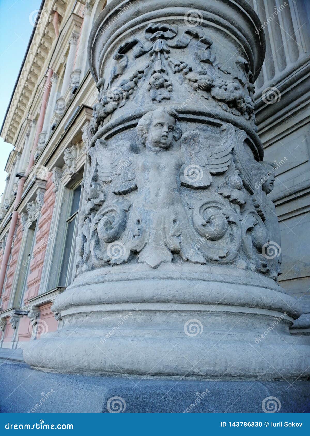 Relief with Angels on the Columns of the Building Stock Photo - Image ...