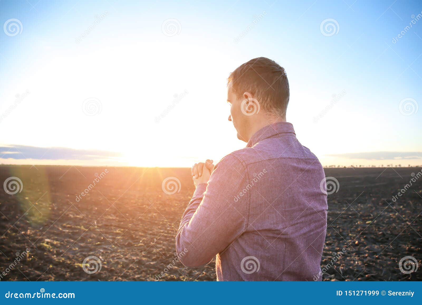 Religious Man Praying Outdoors at Sunset Stock Image - Image of evening ...