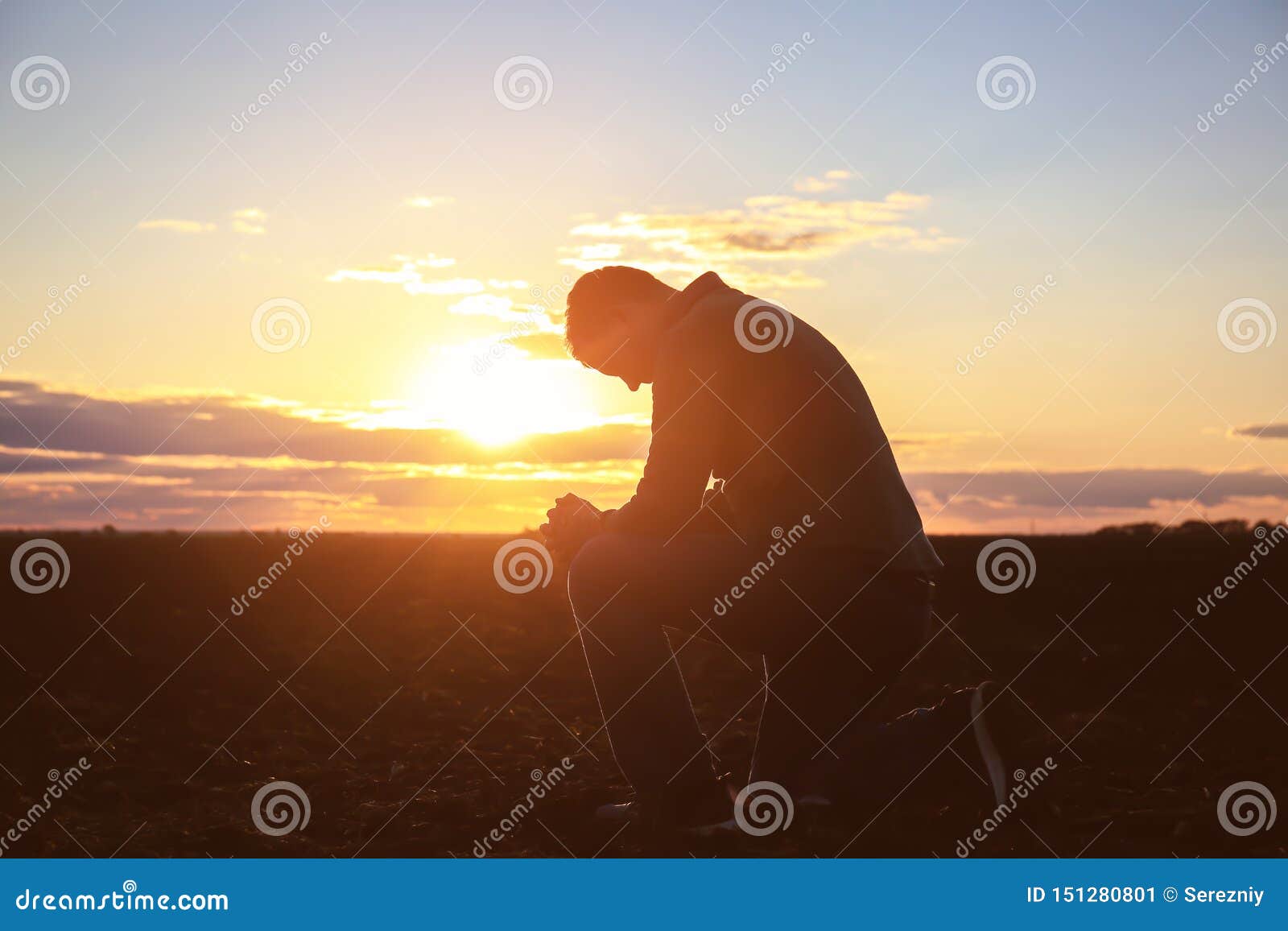Religious Man Praying Outdoors at Sunset Stock Image - Image of believe ...