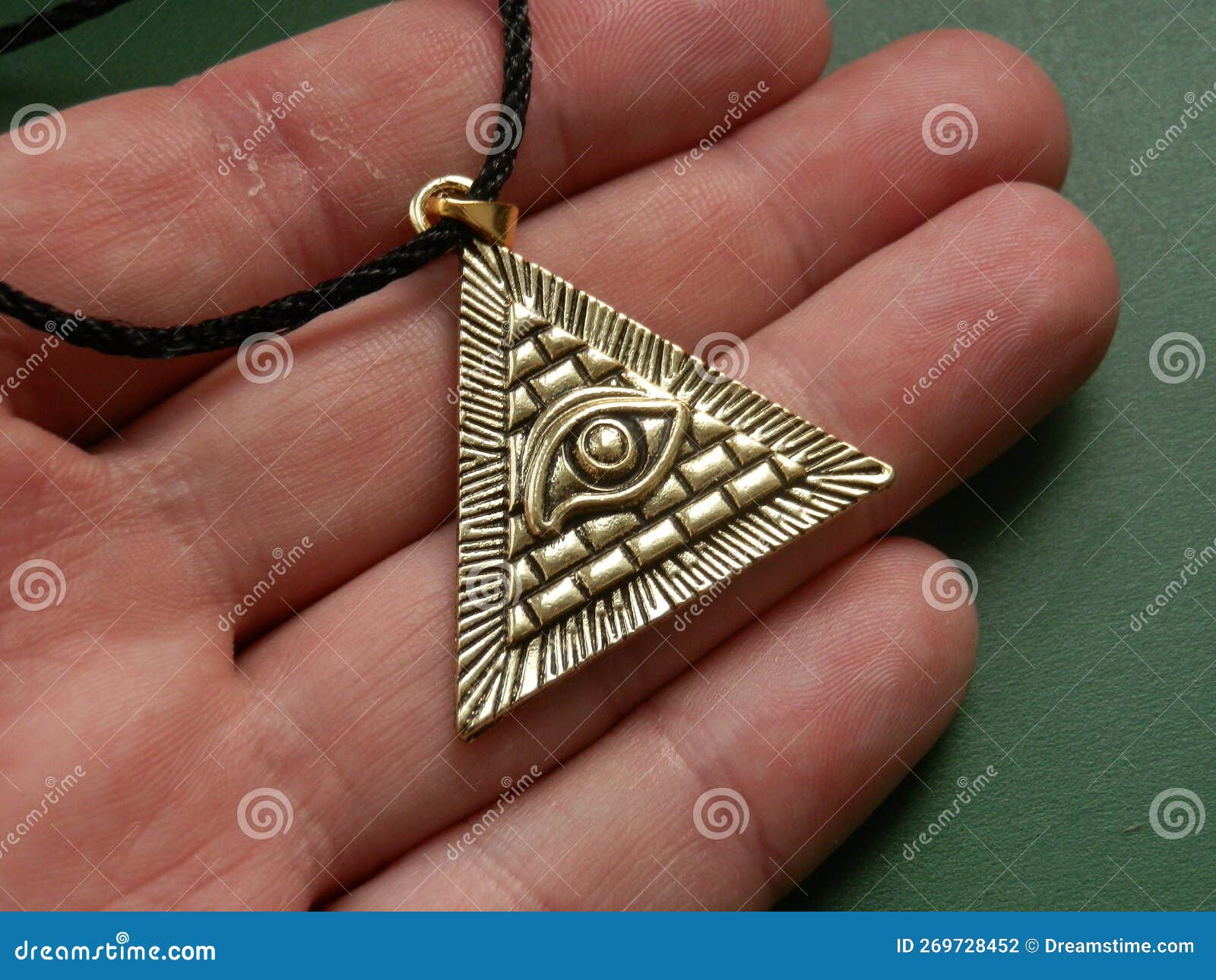 Religious Metal Symbol Medallion in Hand Stock Photo - Image of jewelry ...