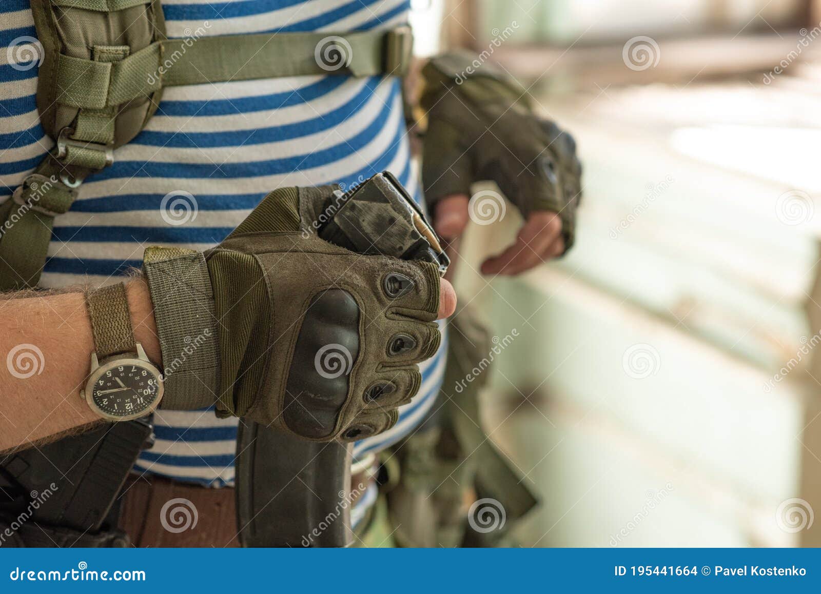 Close Up Of Man Reloading Pistol. Royalty-Free Stock Photography ...