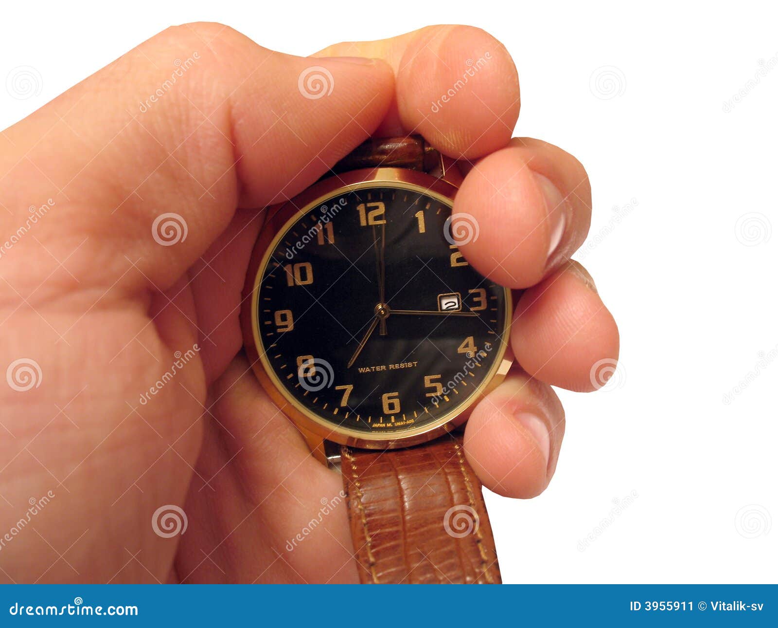 Reloj en la mano aislada imagen de archivo. Imagen de mano - 3955911