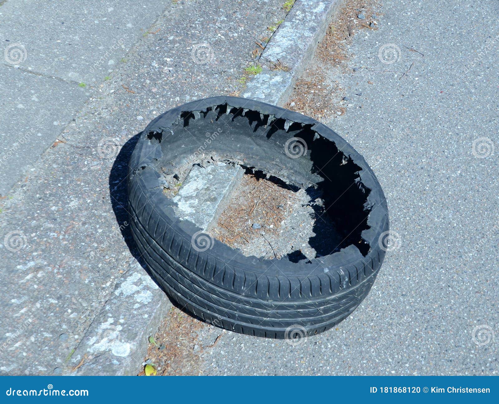 Remains of Exploded Tyre Seen at the Roadside Stock Photo - Image of ...