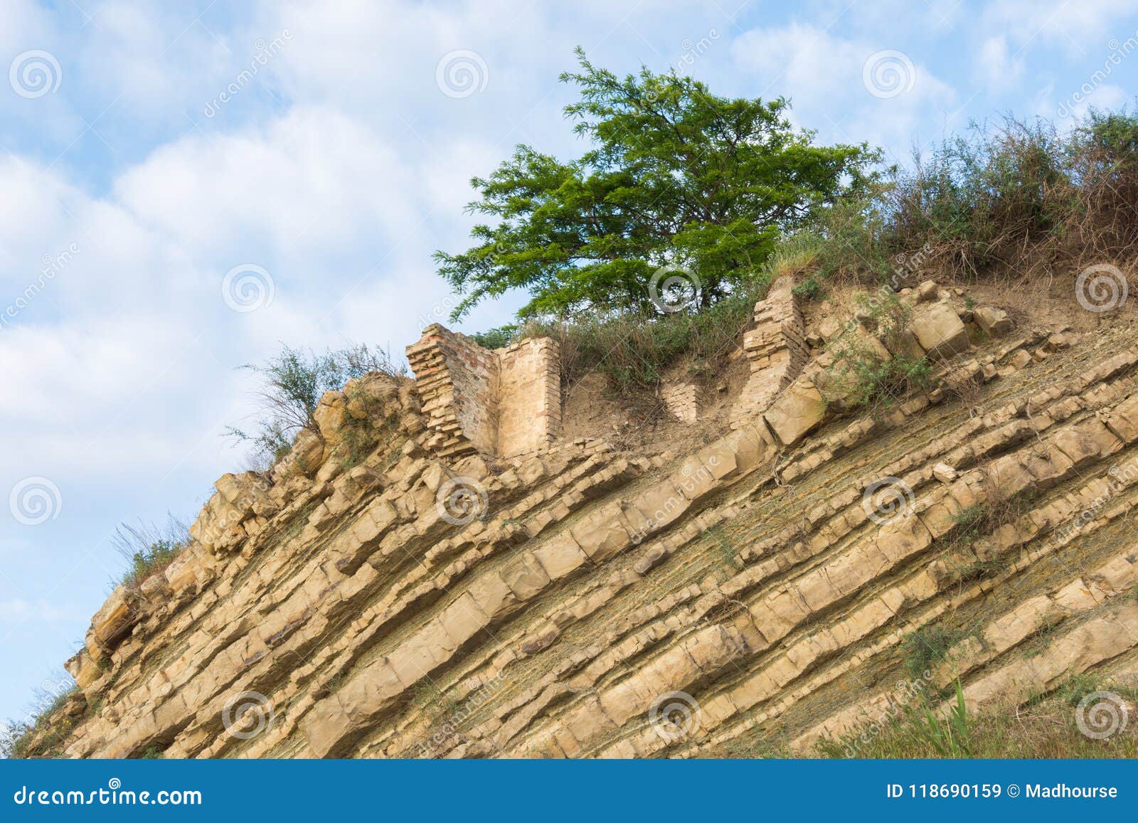 The Remains of Ruined Building on Top of a Rock Stock Image - Image of ...