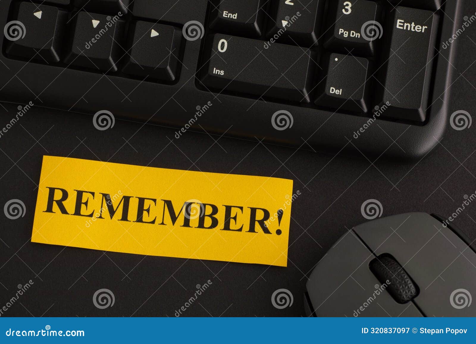 Remember! a Paper Note with the Word Remember on it on a Desk Stock ...
