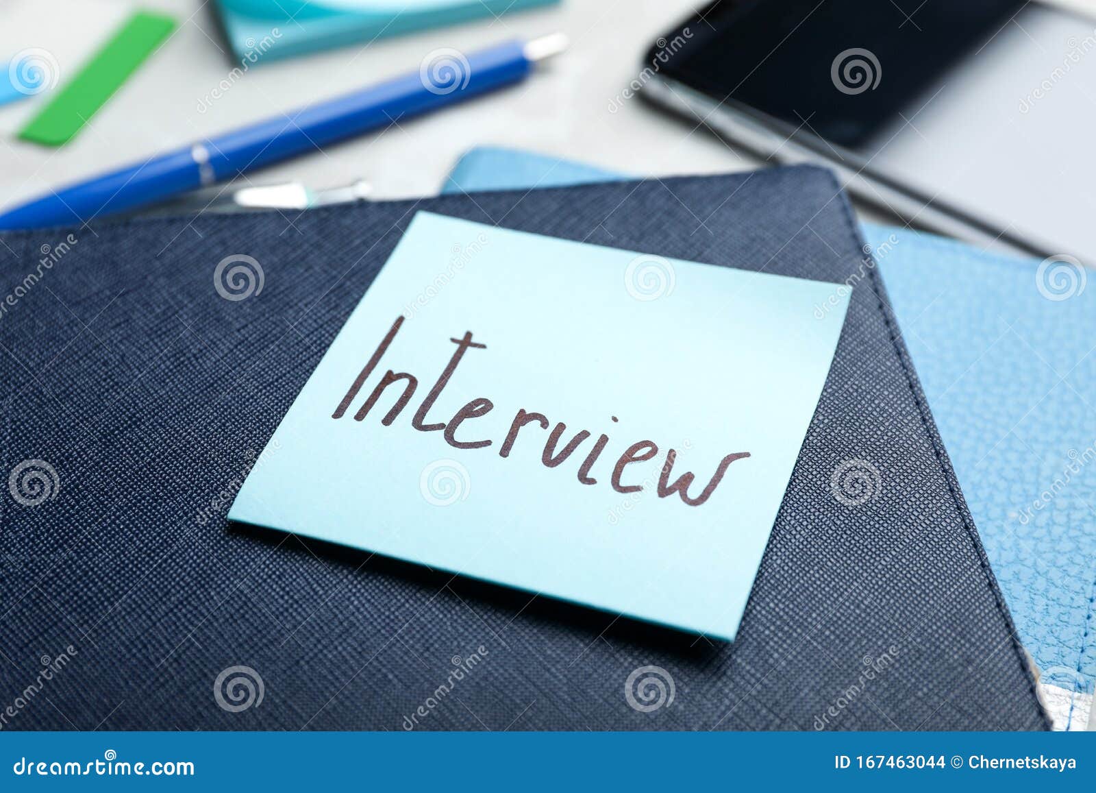Reminder Note about Job Interview and Stationery on Table Stock Photo ...