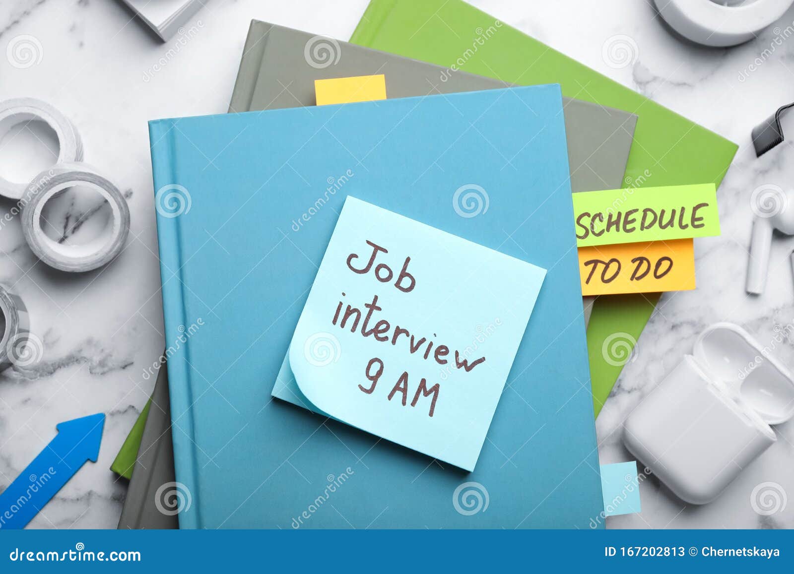 Reminder Note about Job Interview and Stationery on Table Stock Image ...