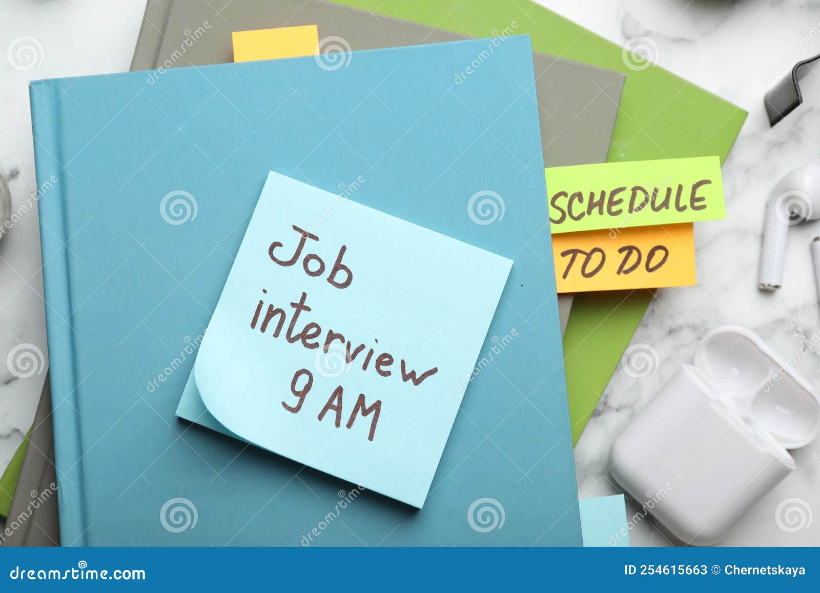 Reminder Note about Job Interview and Stationery on Table Stock Image ...