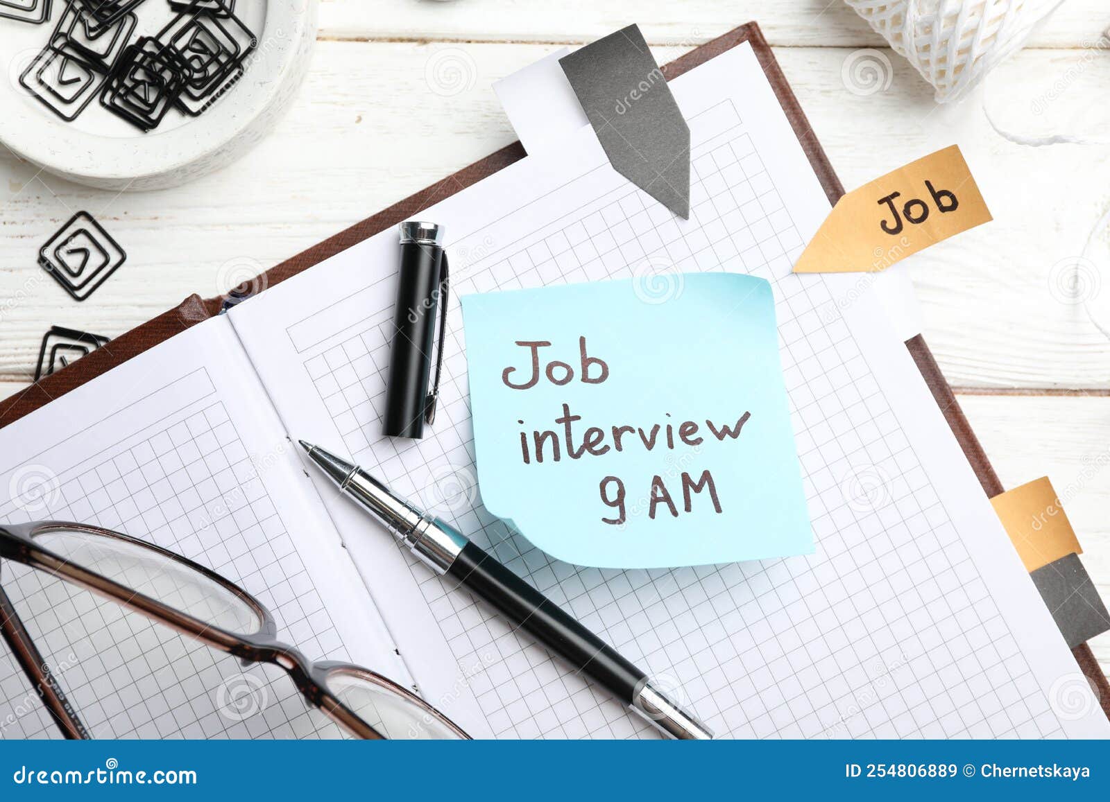Reminder Note about Job Interview and Stationery on Table, Flat Lay ...