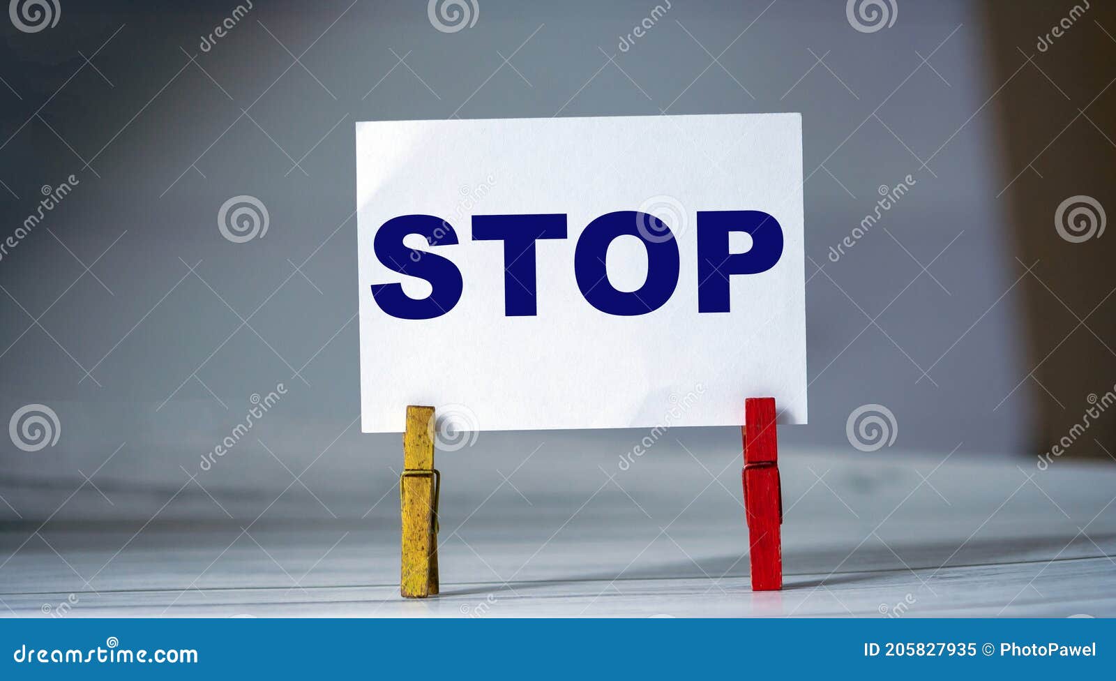 Reminder Sticky Note with Clothes Pin on Table. Sticky Note with Word ...