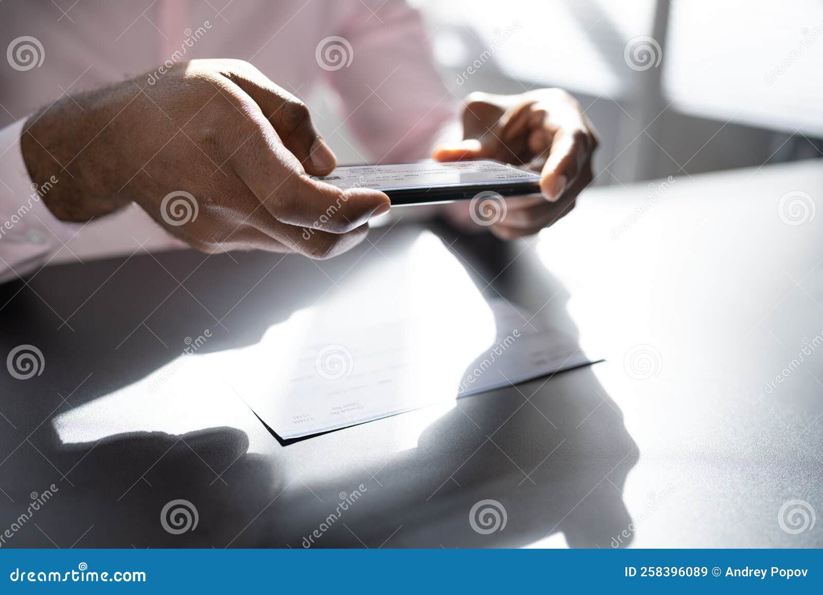 Remote Check Deposit stock image. Image of deposit, hand - 258396089