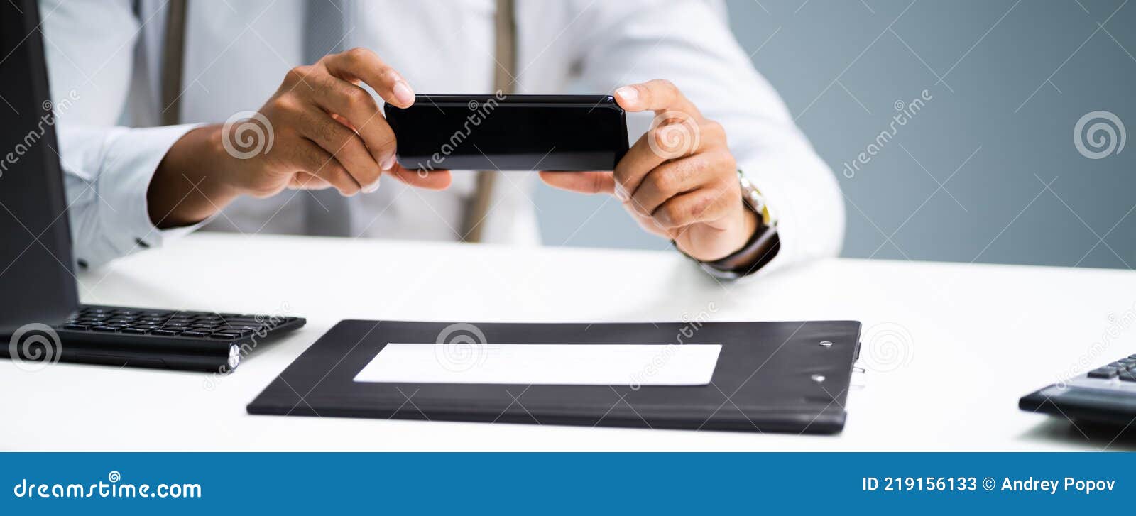 Remote Check Deposit Using Mobile Phone Stock Image - Image of black ...