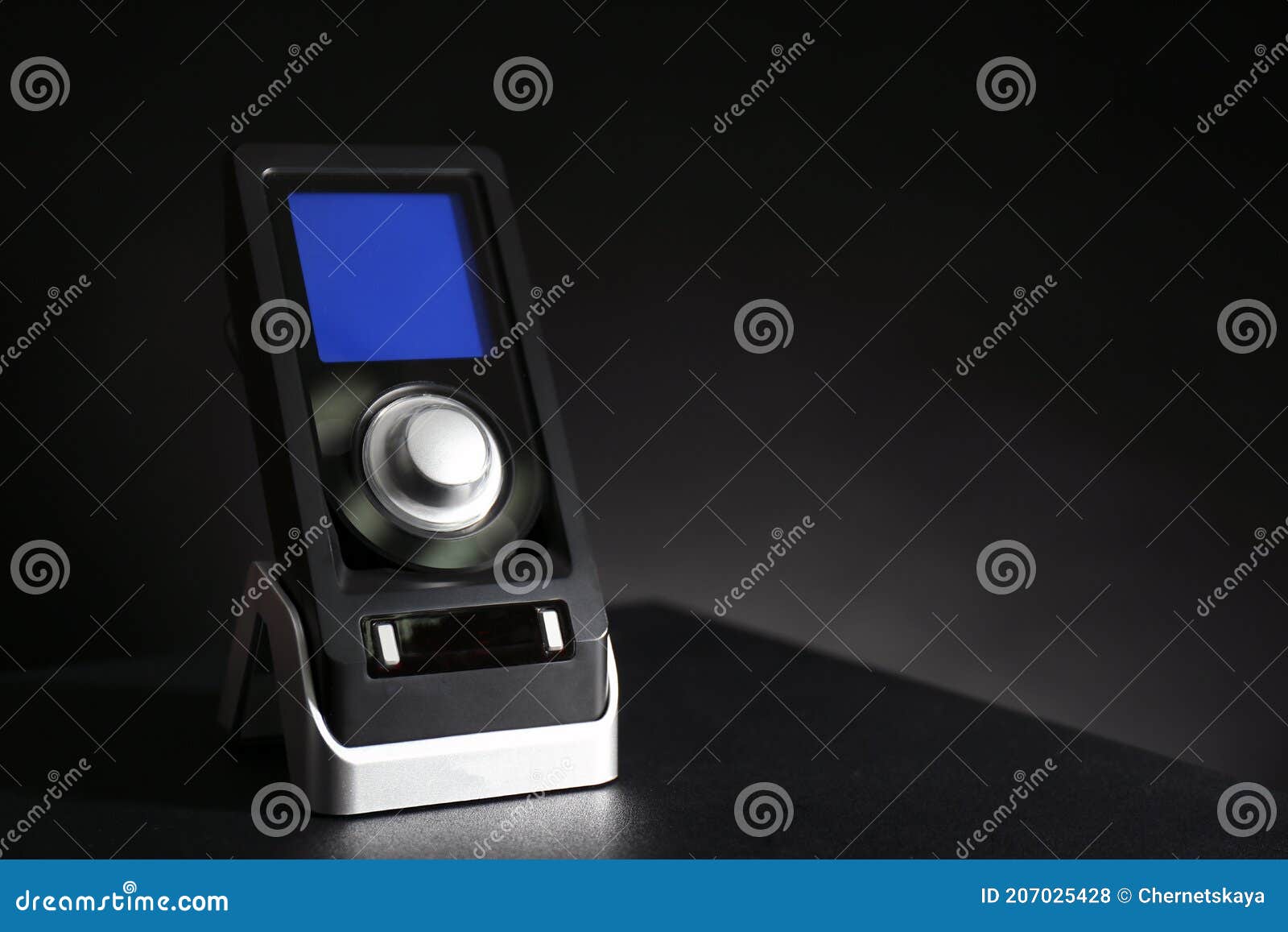 Remote Control of Audio Speaker System on Black Table. Space for Text ...