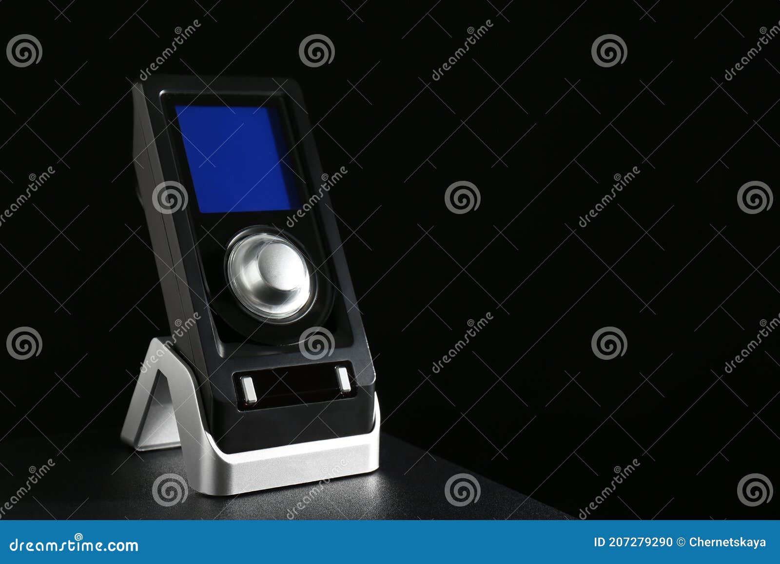 Remote Control of Audio Speaker System on Black Table. Space for Text ...