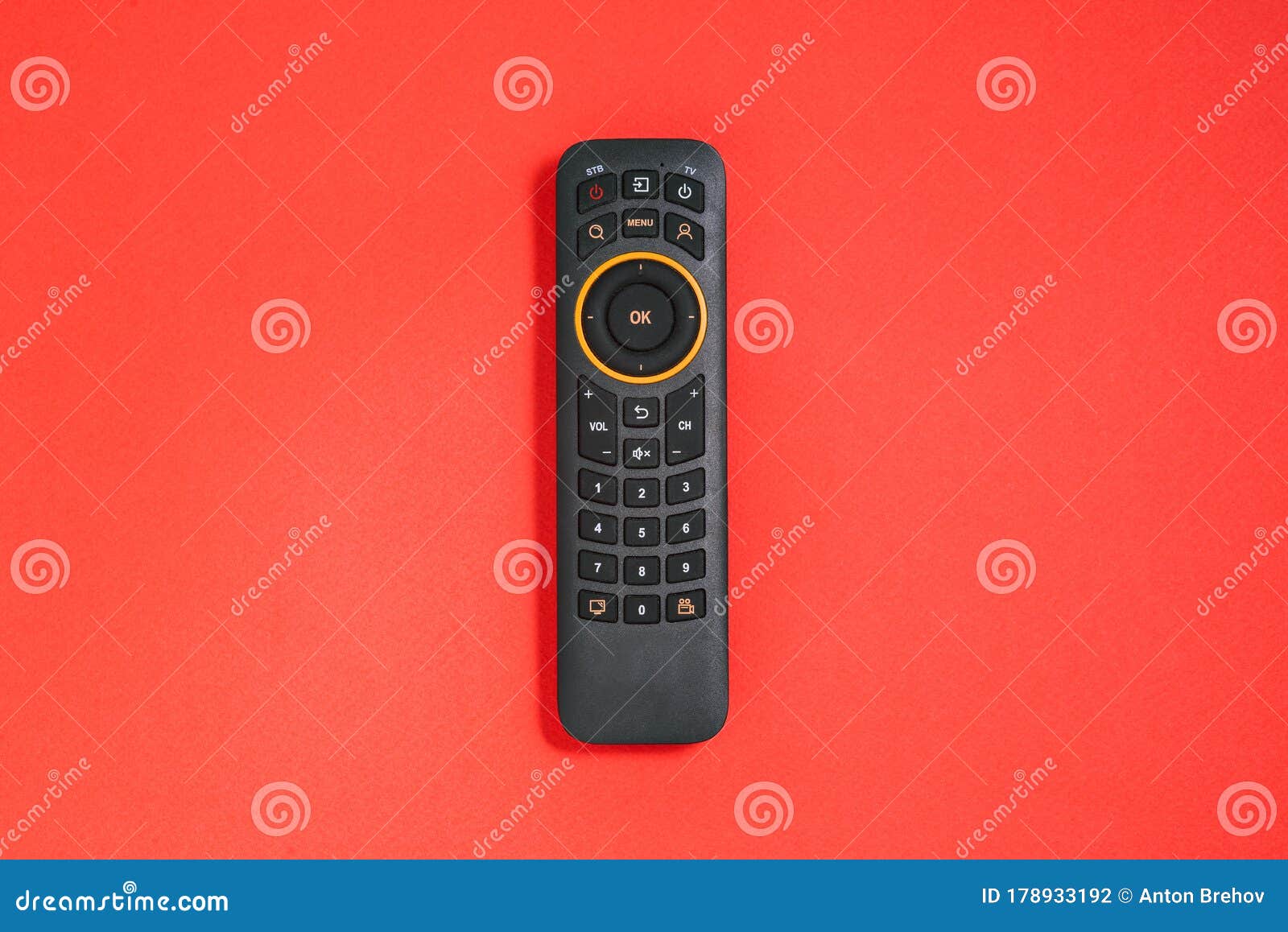Remote Control with Buttons on a Red Background. Smart TV Concept Stock ...