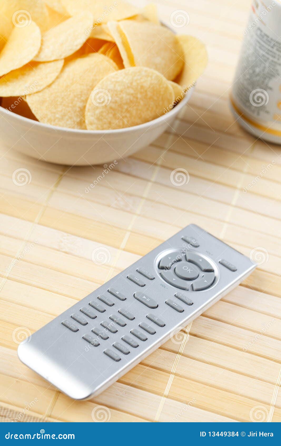 Remote control and chips stock photo. Image of remote - 13449384