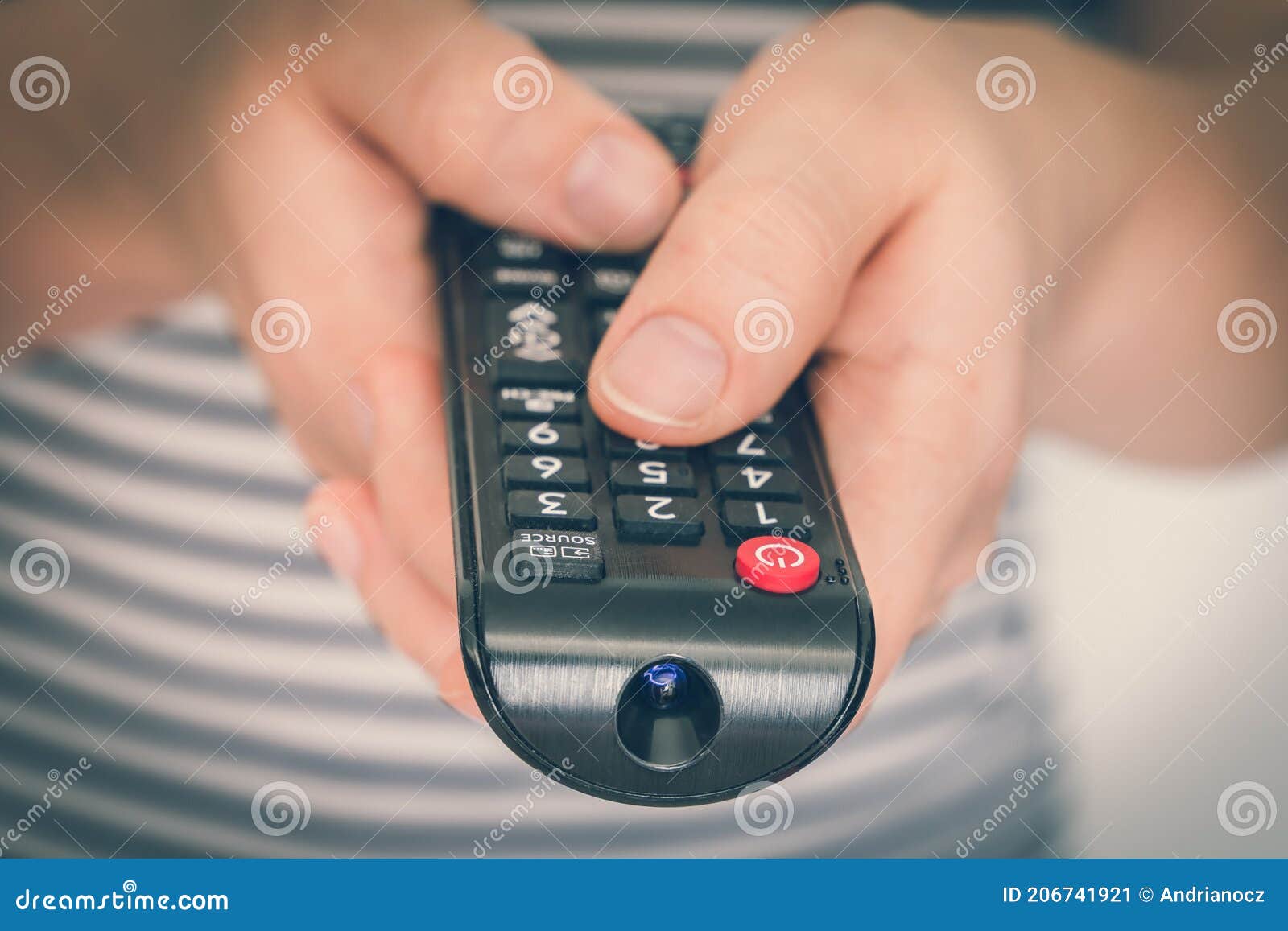 Remote Control in Female Hands Pointing To TV Stock Image - Image of ...