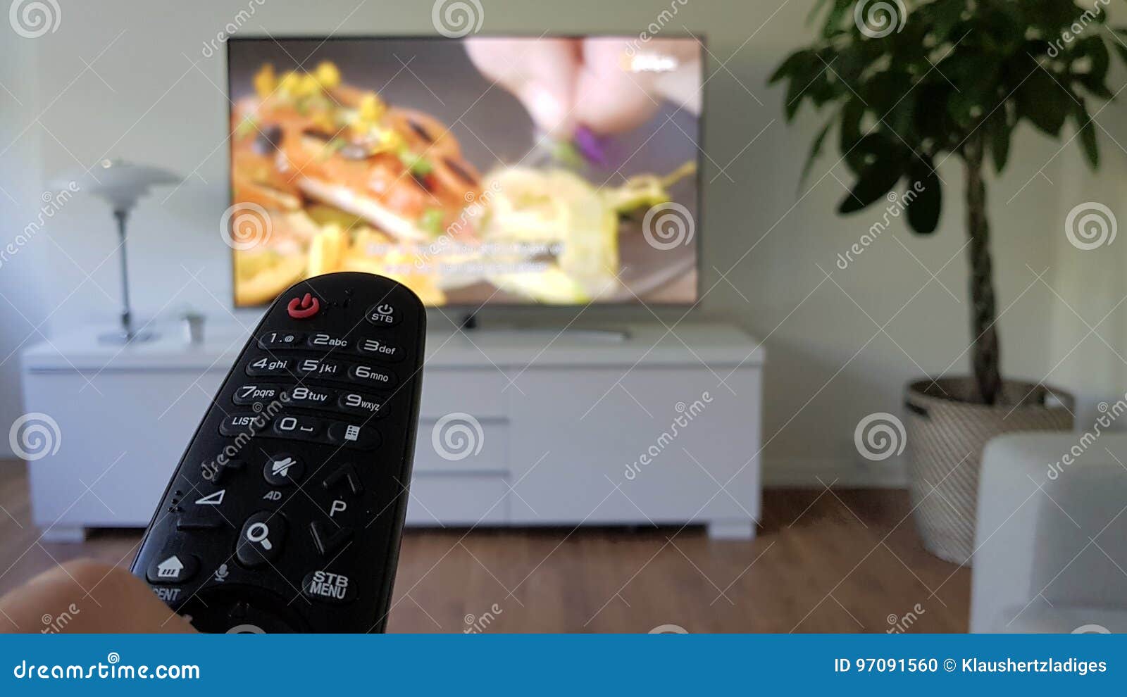 Remote Control in Front of Television Stock Photo - Image of front ...