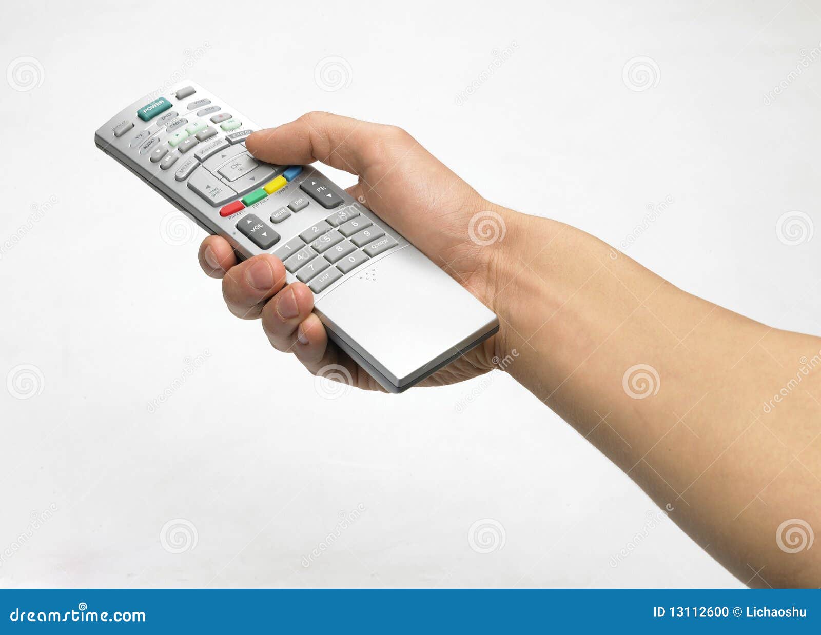 Remote control and hand stock photo. Image of remote - 13112600