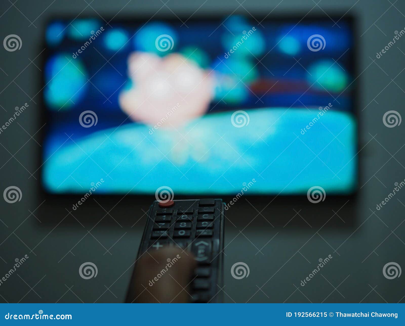 The Remote Control Image on the TV Background is Out of Focus Stock ...