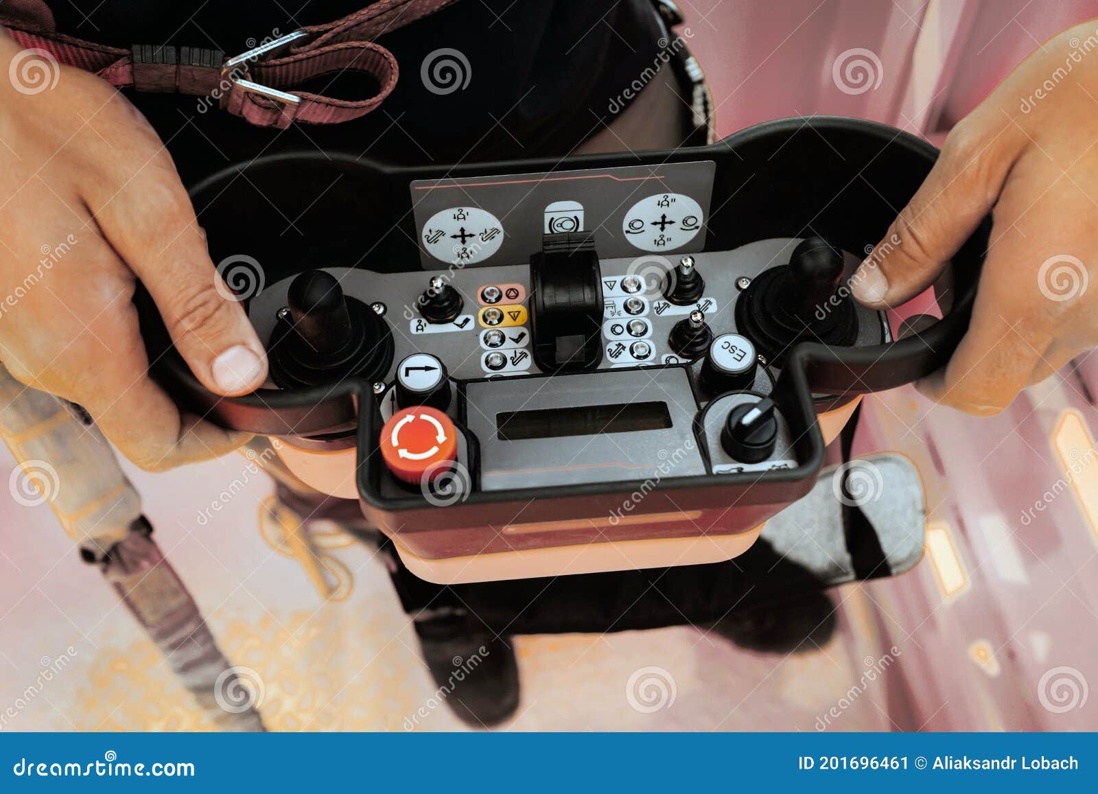 Remote Control of a Lifting Car Crane in the Hands of a Person. Panel ...