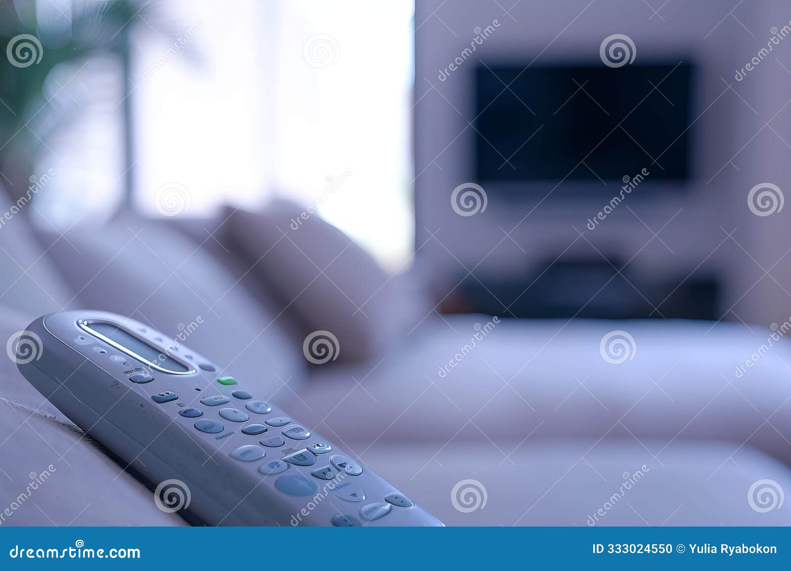 Remote Control Lying on Sofa in Living Room Stock Photo - Image of ...