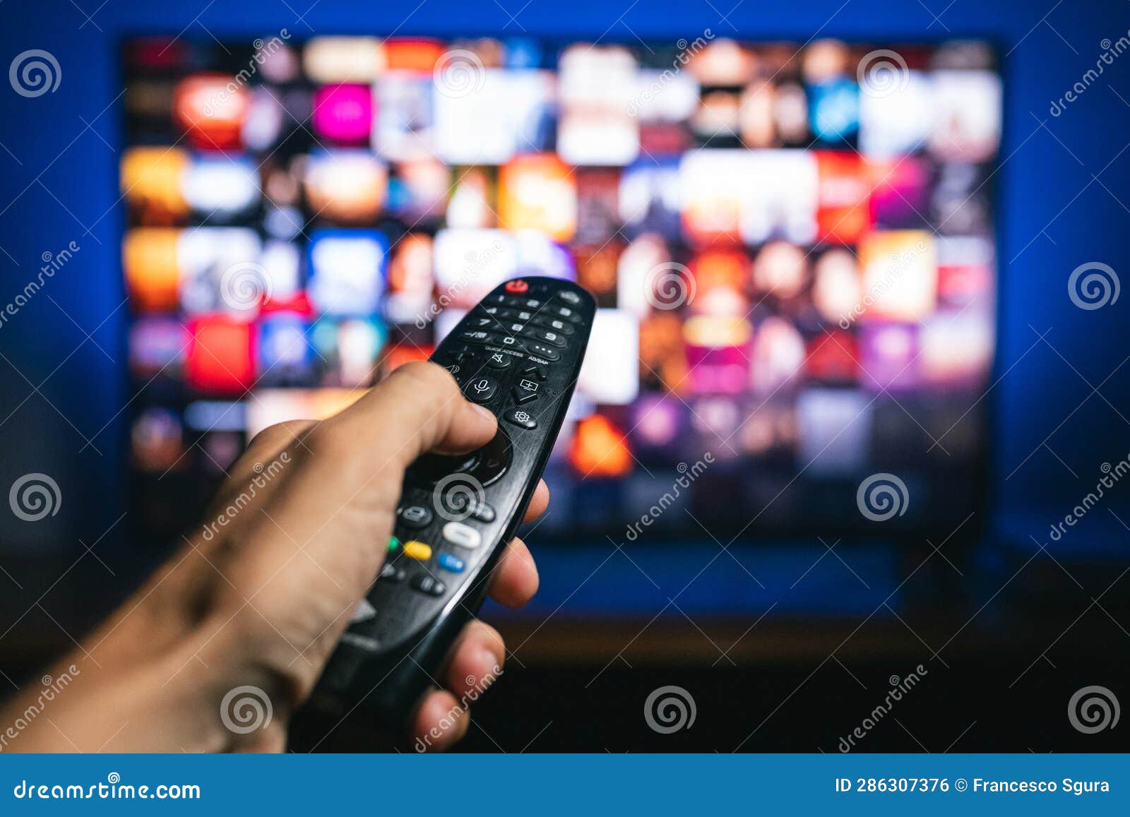 Remote Control Pointing at a TV Stock Photo - Image of wall, play ...