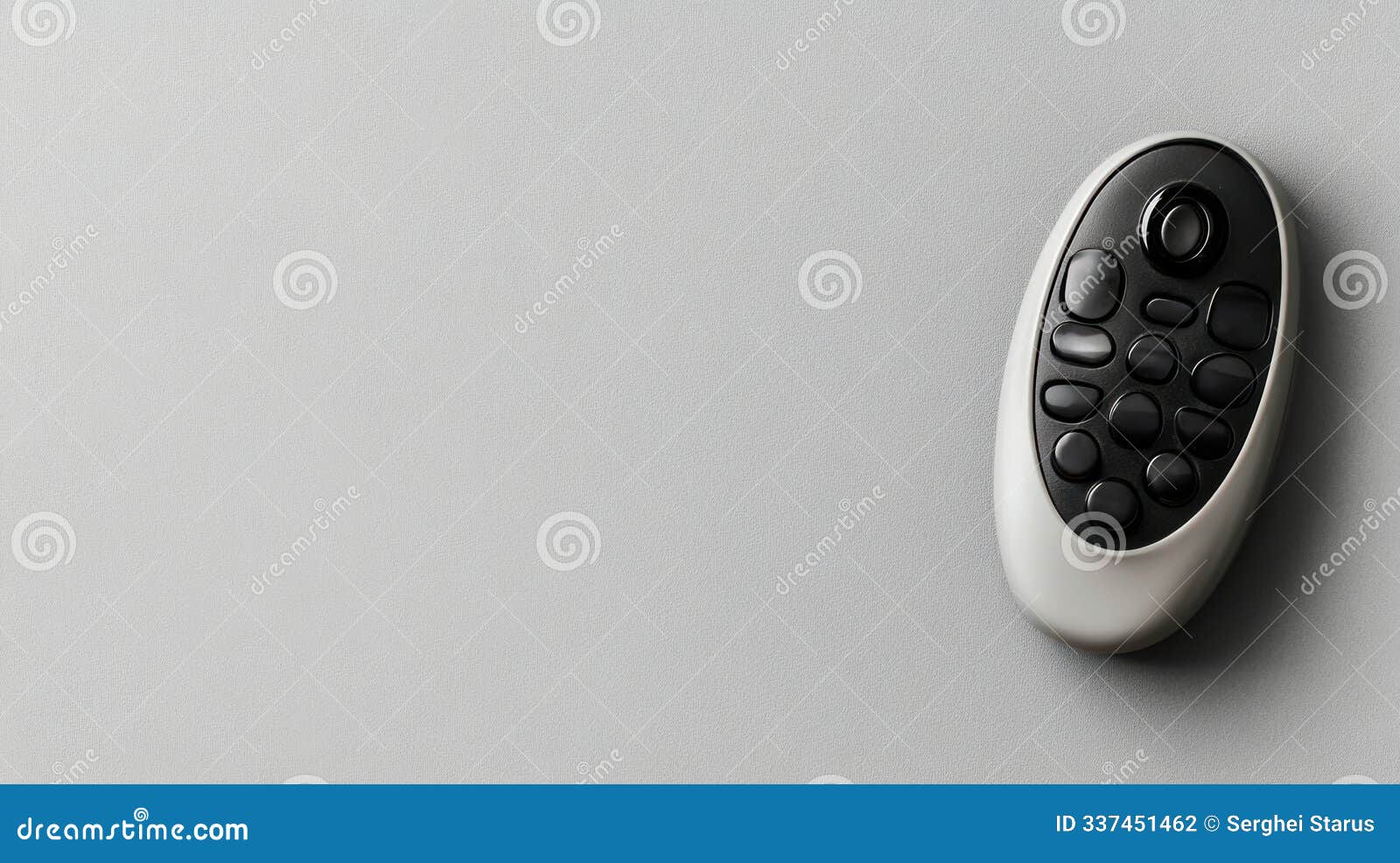 A Remote Control Sitting on a Gray Wall with No Buttons, AI Stock Photo ...