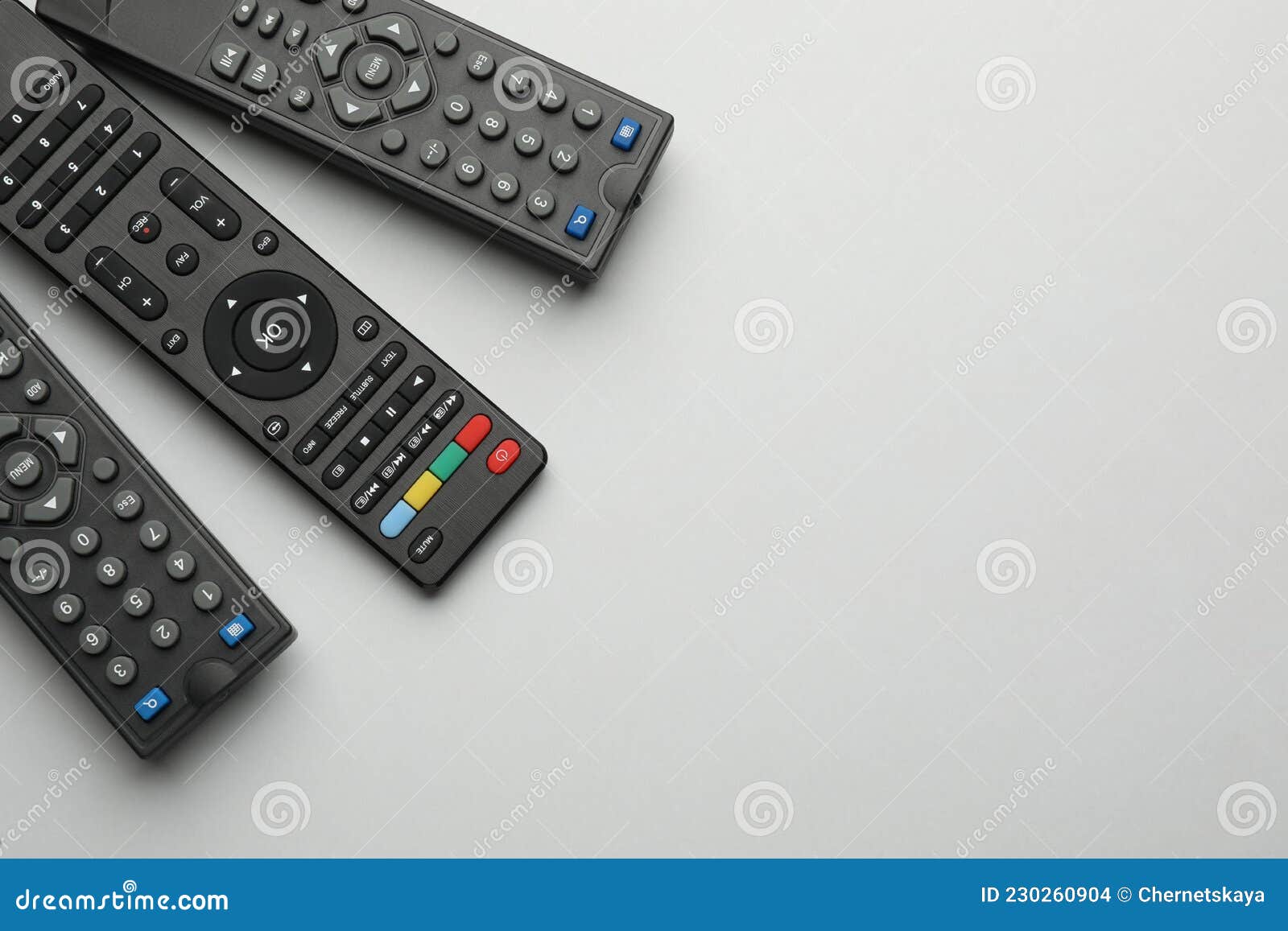 Remote Controls on Light Grey Background, Flat Lay. Space for Text ...