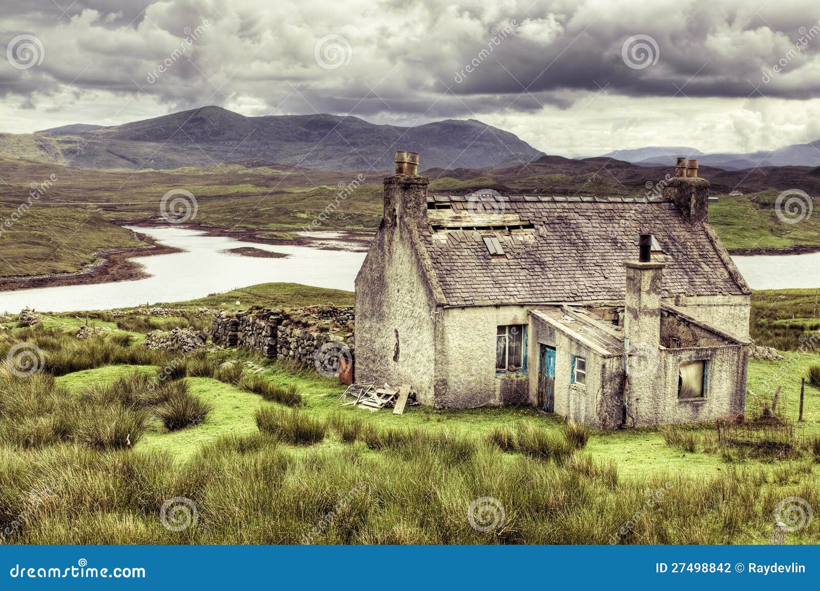 A Remote Cottage Set Against a Mountainous Scottis Stock Photo - Image ...