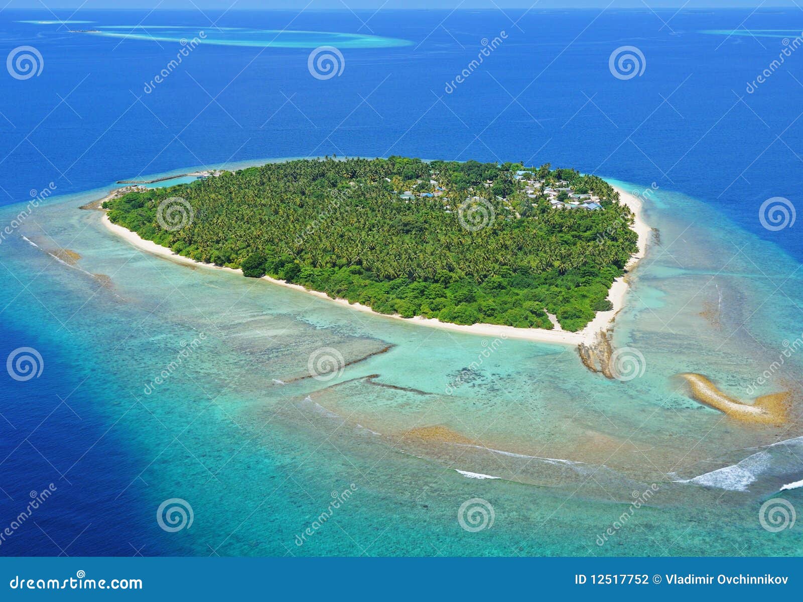 Remote Island in the ocean stock photo. Image of translucent - 12517752