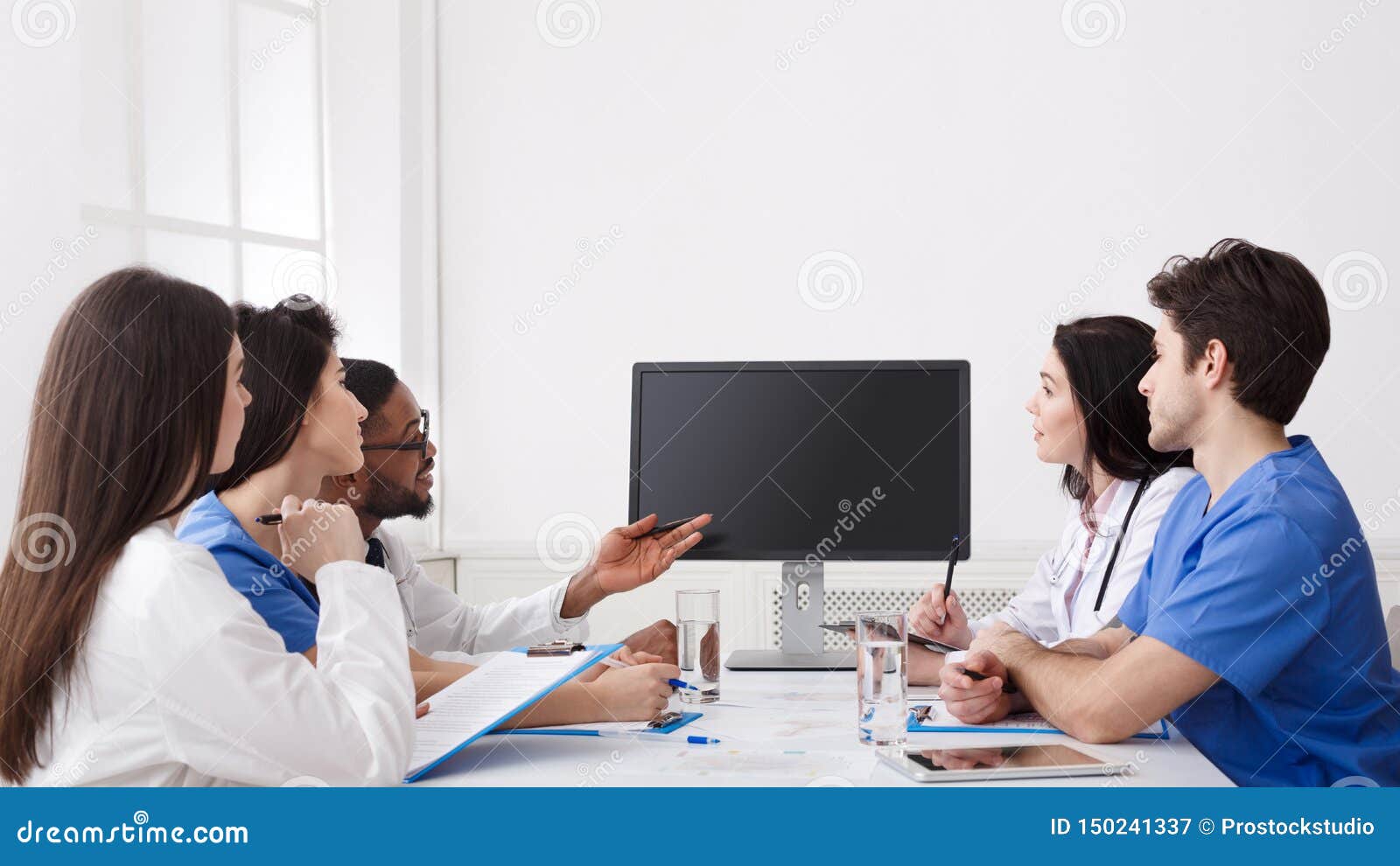 Remote Medicine. Team of Doctors Parsing Difficult Case from Patient ...