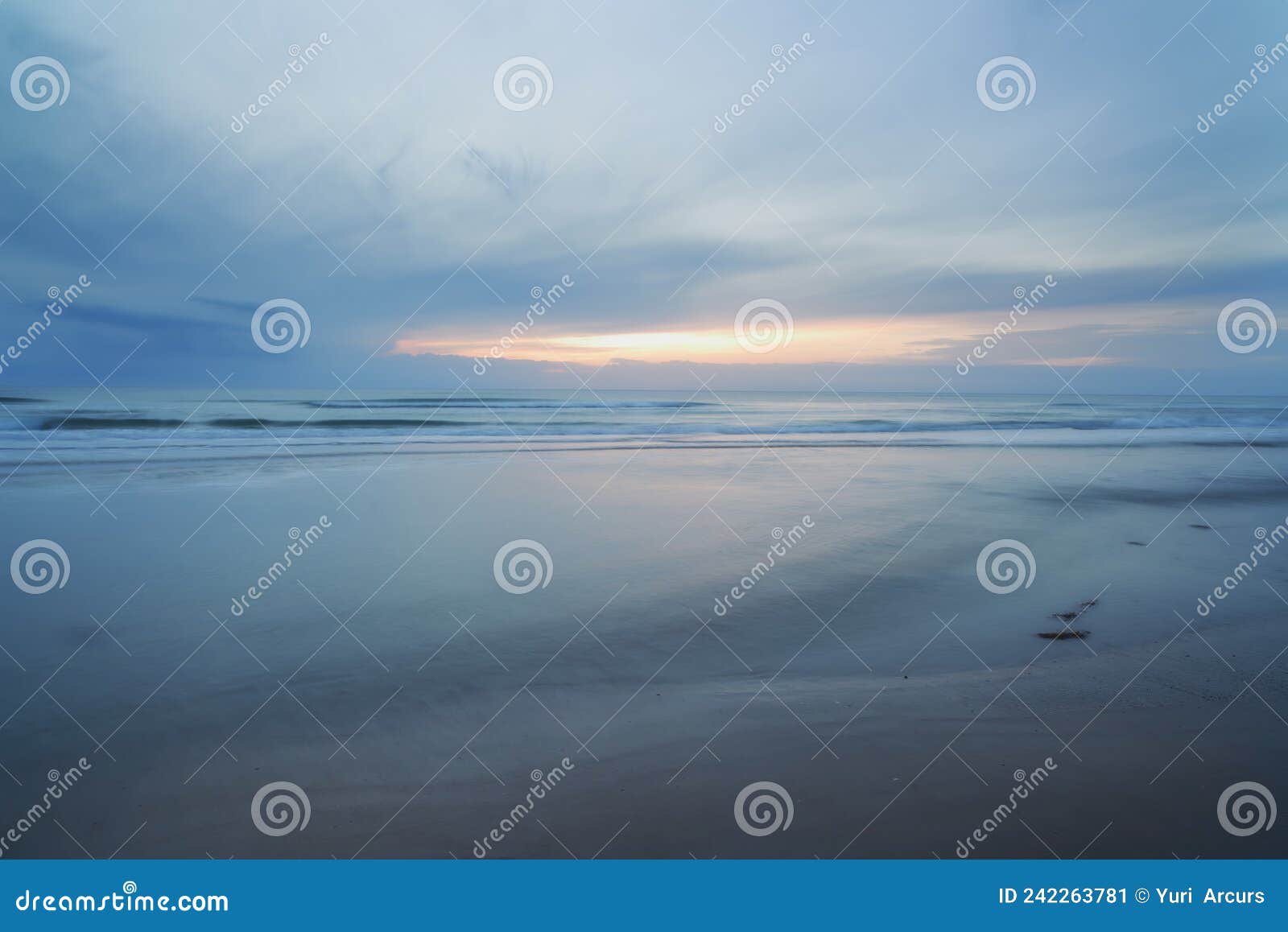 Remote Natural Beauty. a Sunset Over a Desolate Cloudy Beach. Stock ...