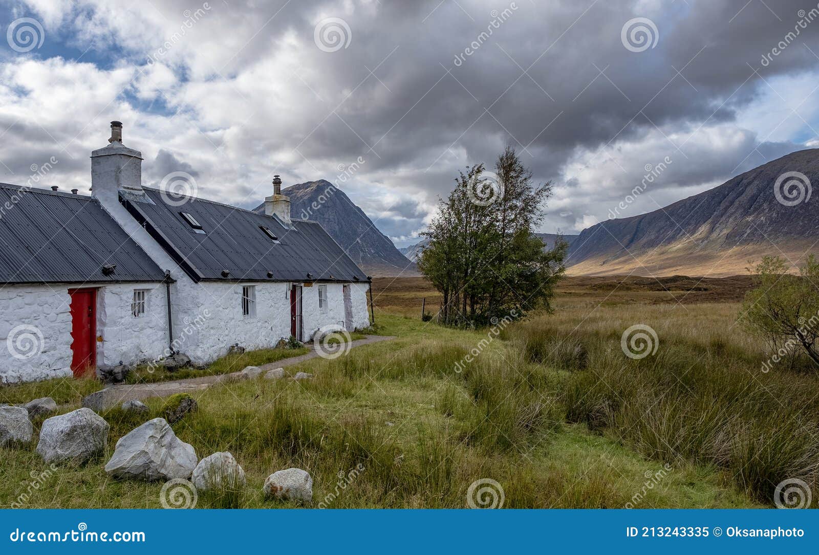 Remote cottage in Glencoe stock image. Image of scenic - 213243335