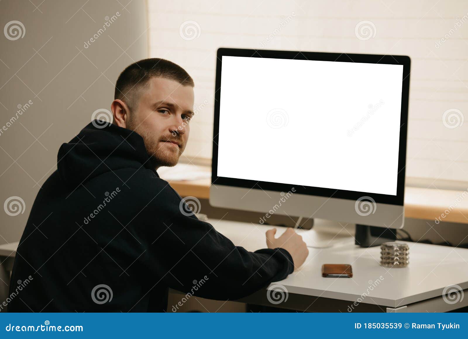 A Back View of a Businessman Works Remotely Using an All-in-one ...