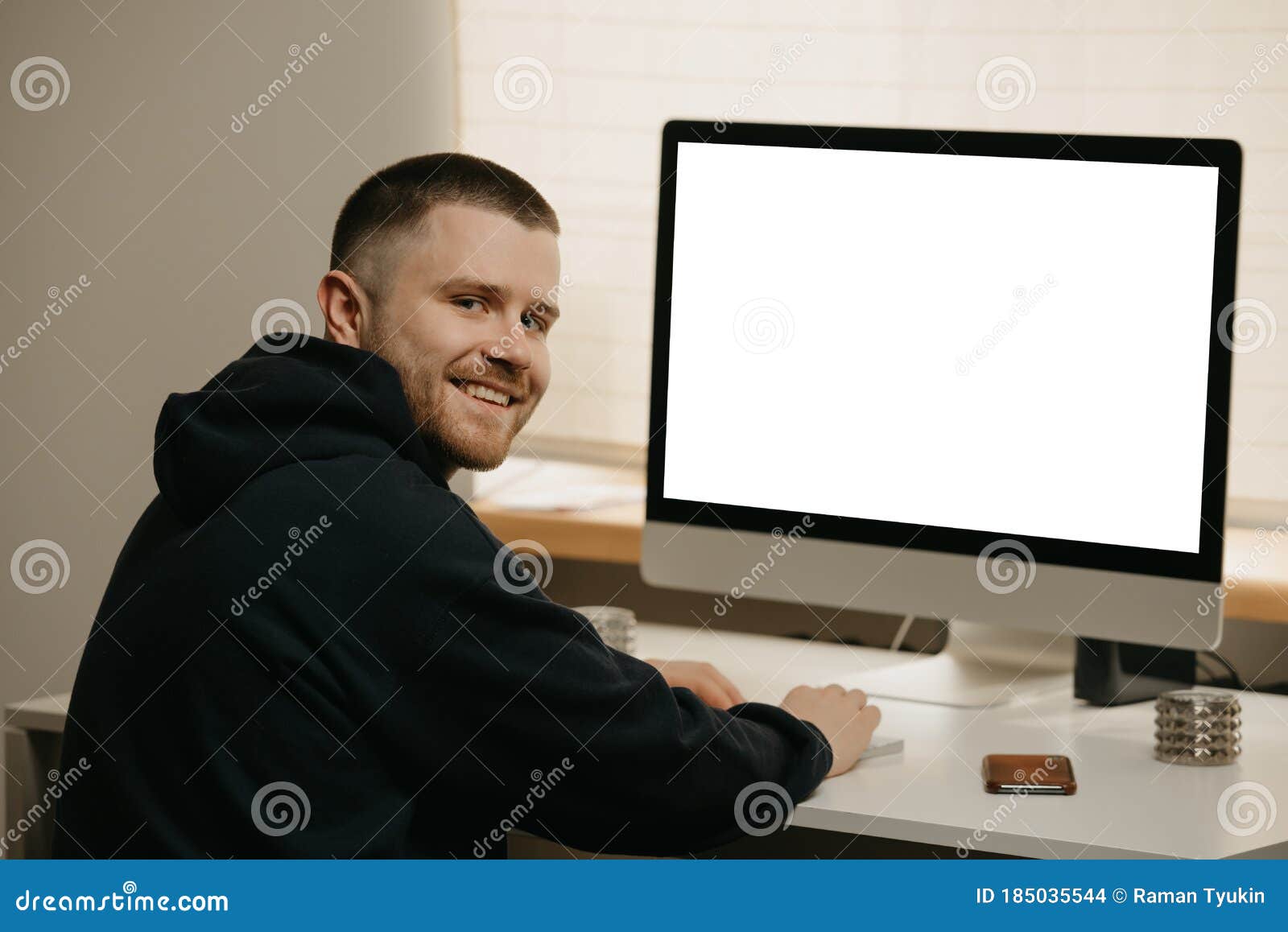 A Back View of a Businessman Works Remotely Using an All-in-one ...